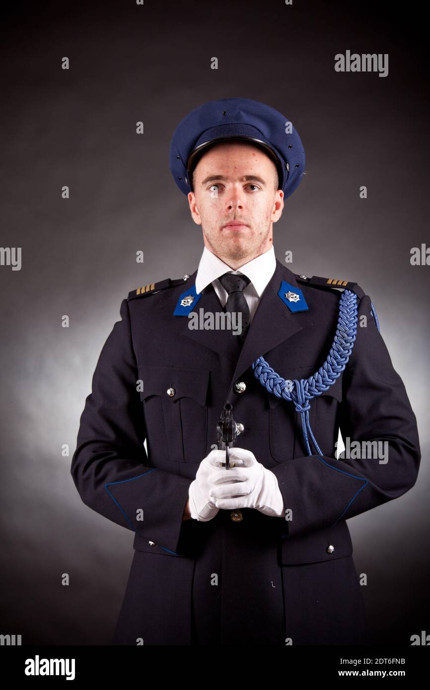 elegant soldier wearing uniform in studio Stock Photo - Alamy