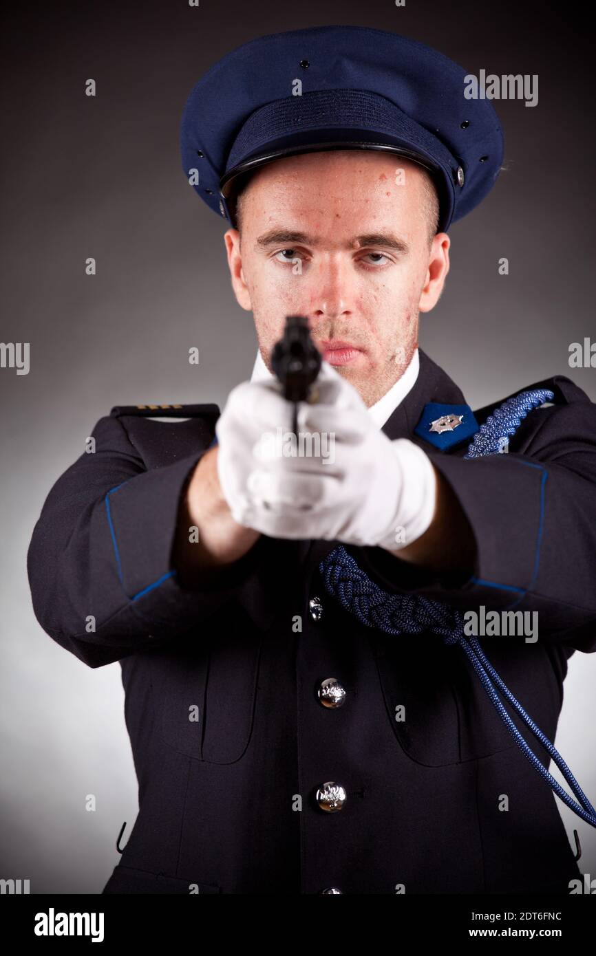 elegant soldier wearing uniform in studio Stock Photo - Alamy