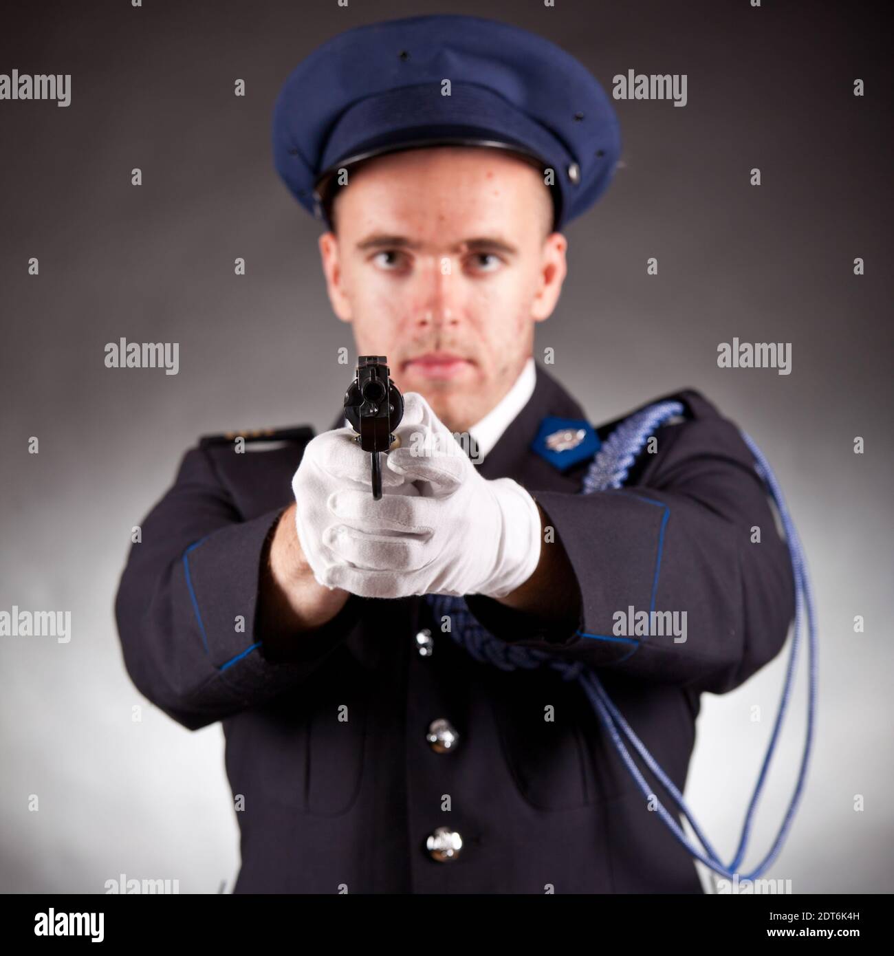 elegant soldier shoot -focus on gun Stock Photo - Alamy