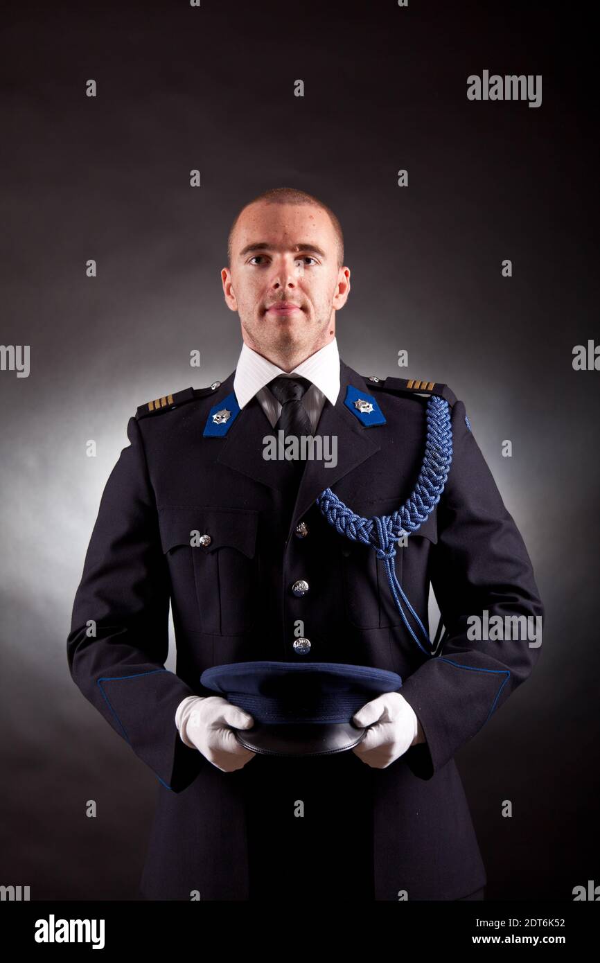 elegant soldier wearing uniform in studio Stock Photo - Alamy