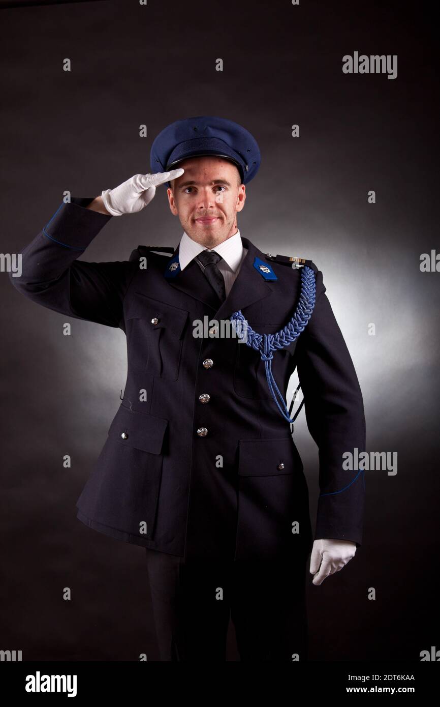 elegant soldier wearing uniform in studio Stock Photo - Alamy