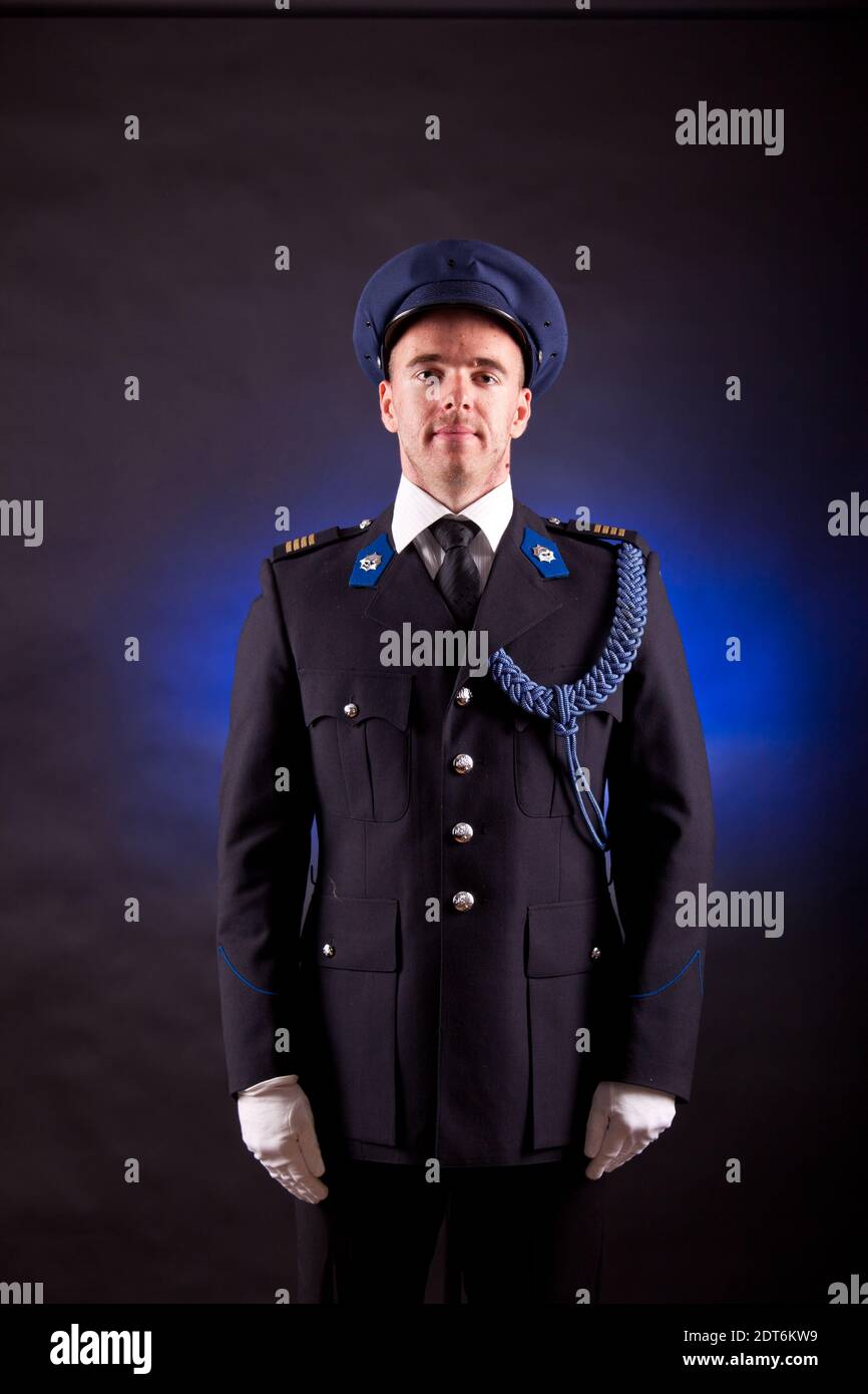 elegant soldier wearing uniform in studio Stock Photo - Alamy