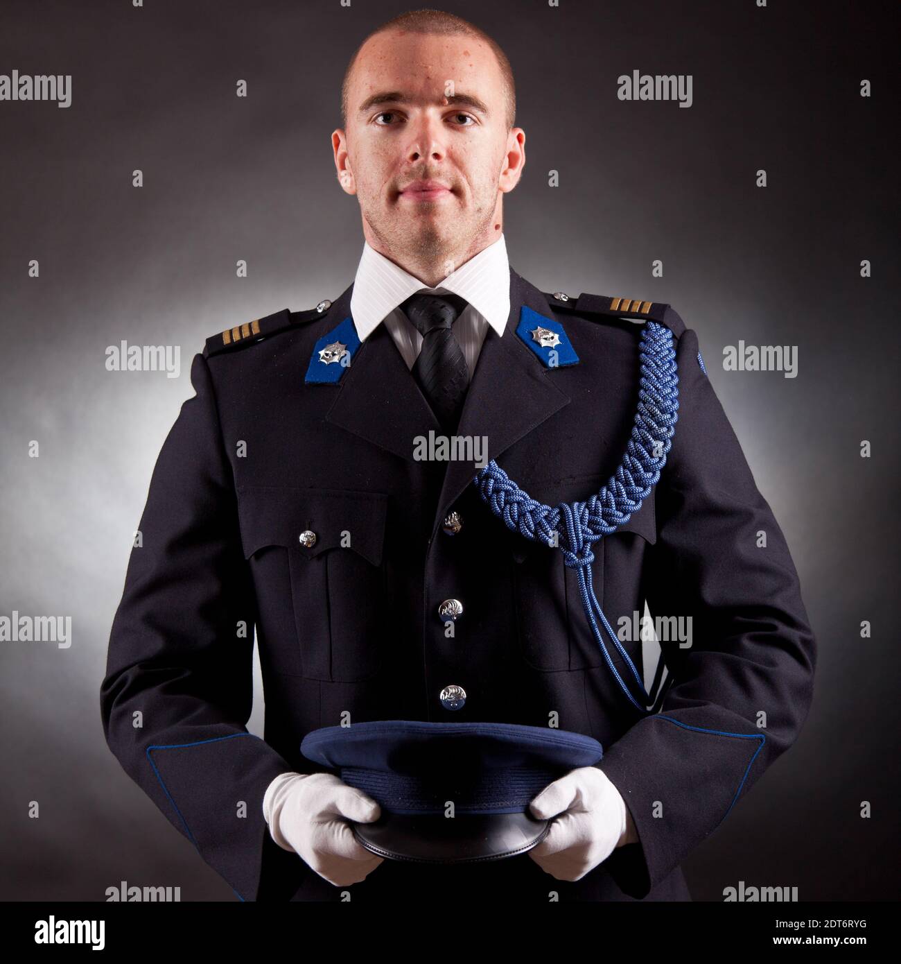 elegant soldier wearing uniform in studio Stock Photo - Alamy