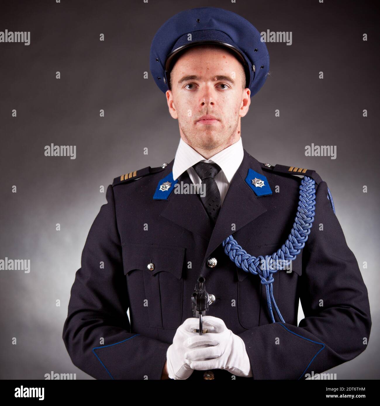 elegant soldier wearing uniform in studio Stock Photo - Alamy