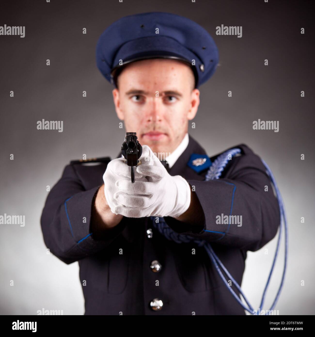 elegant soldier shoot -focus on gun Stock Photo - Alamy