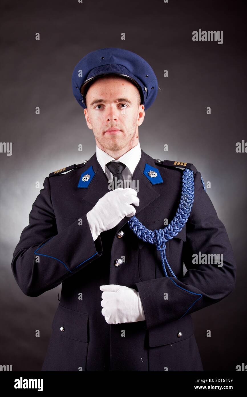 elegant soldier wearing uniform in studio Stock Photo - Alamy