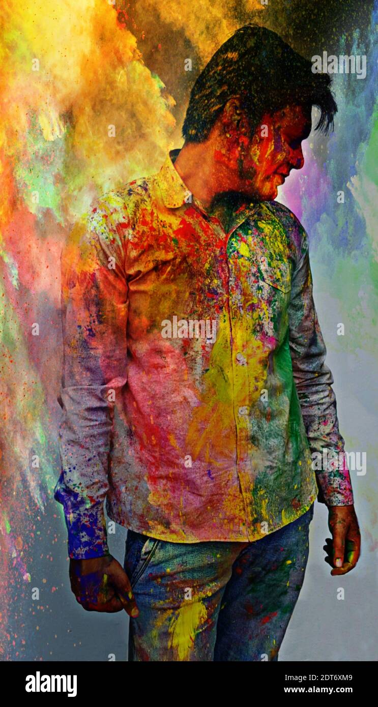 Man Covered In Powder Paint Standing Outdoors Stock Photo - Alamy