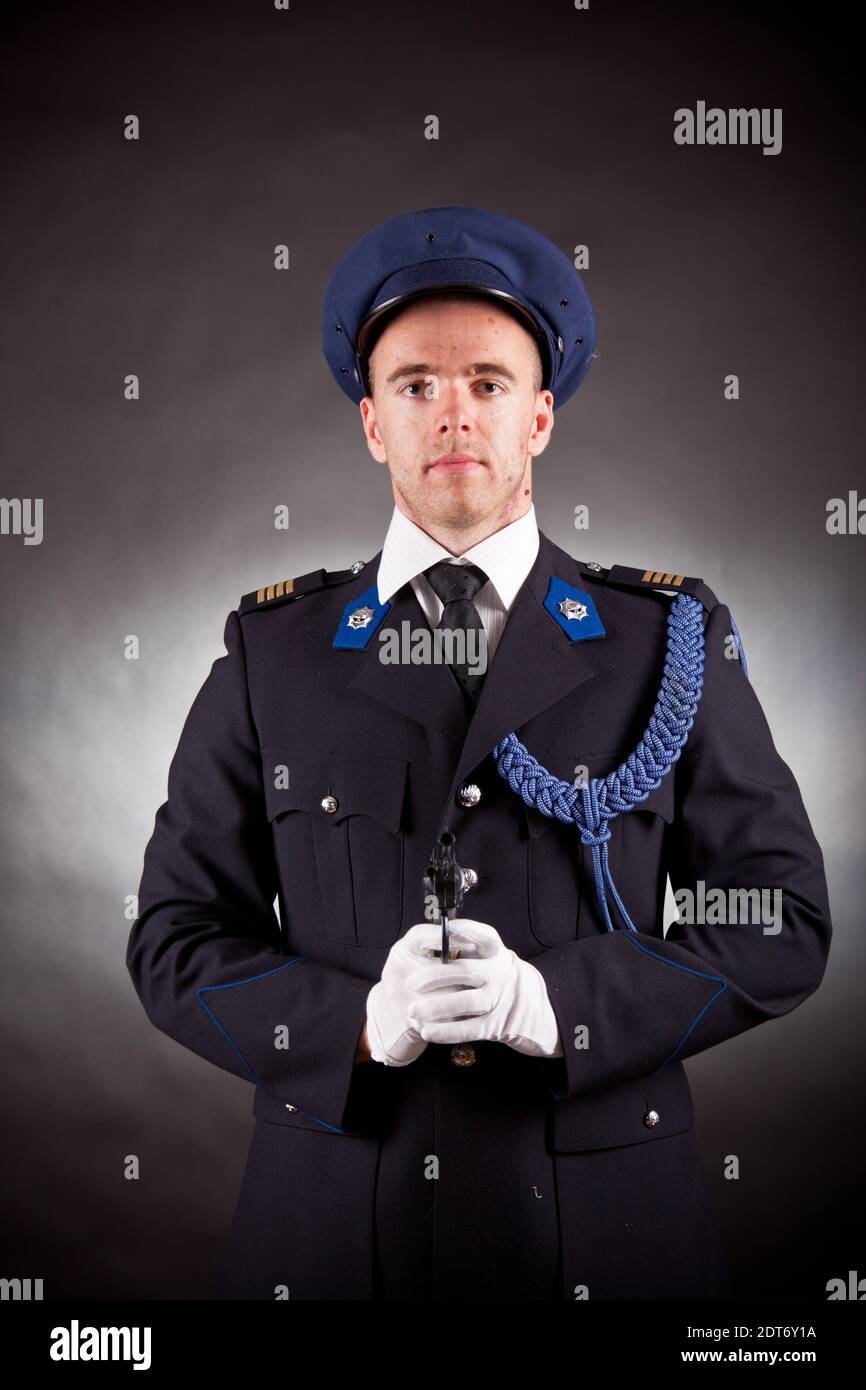 elegant soldier wearing uniform in studio Stock Photo - Alamy