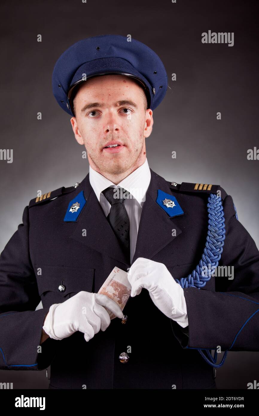 elegant soldier wearing uniform in studio Stock Photo - Alamy