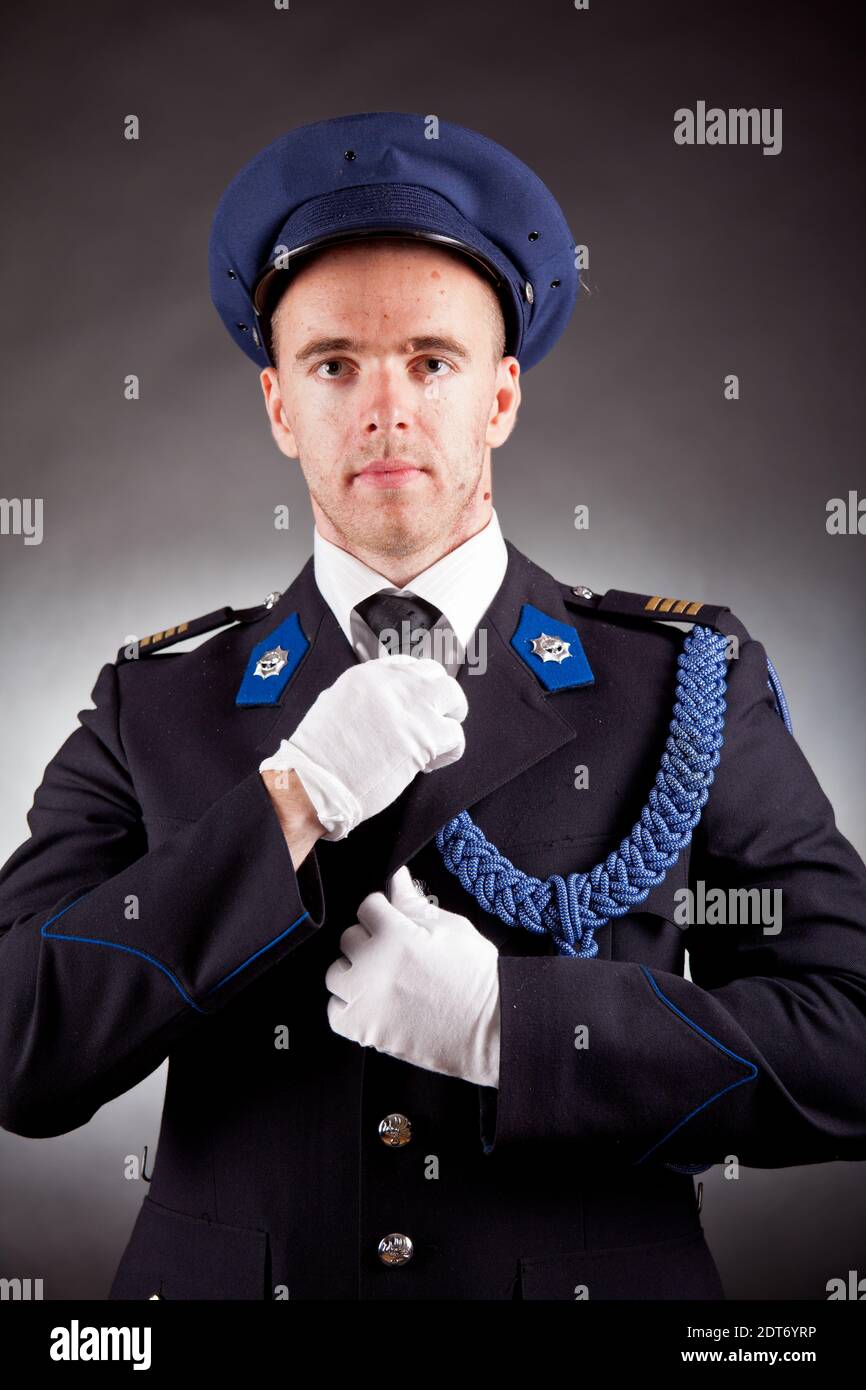 elegant soldier wearing uniform in studio Stock Photo - Alamy
