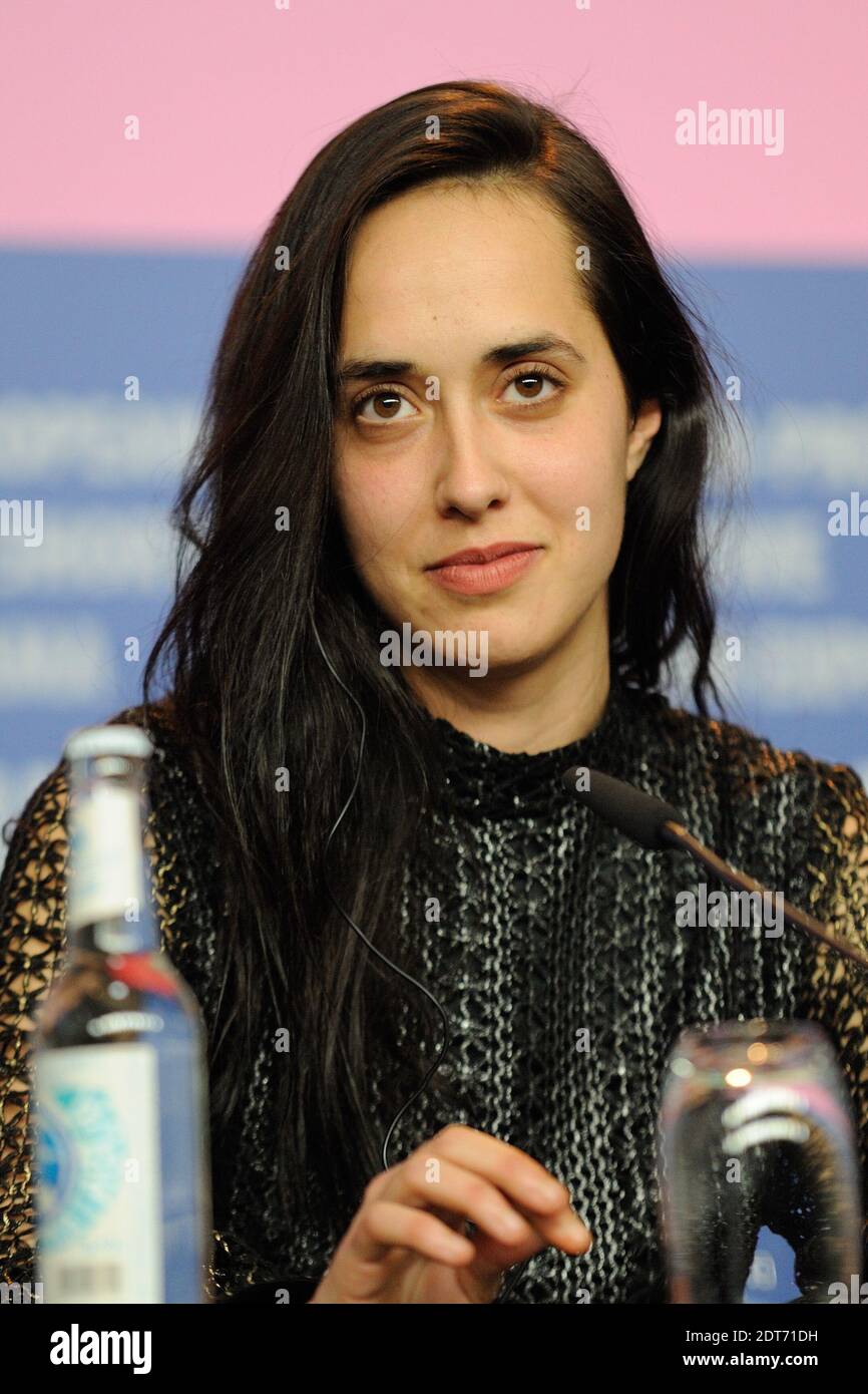 Caroline Poggi poses with their bear trophy after being awarded the ...