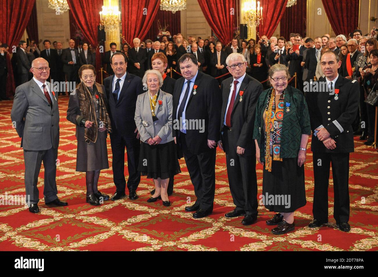 French President Francois Hollande poses with the awardees (L-R ...