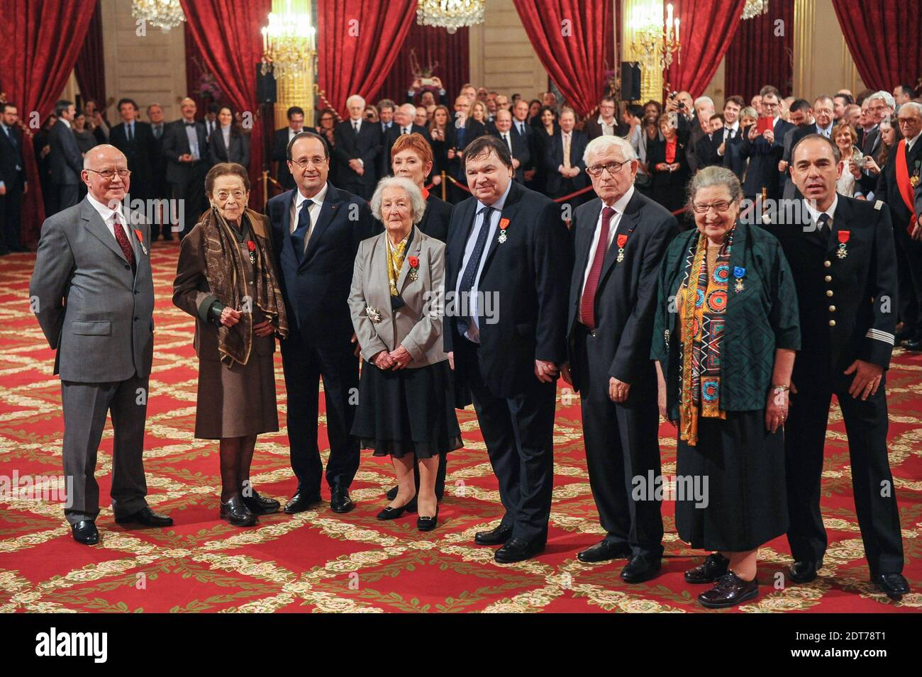 French President Francois Hollande poses with the awardees (L-R ...