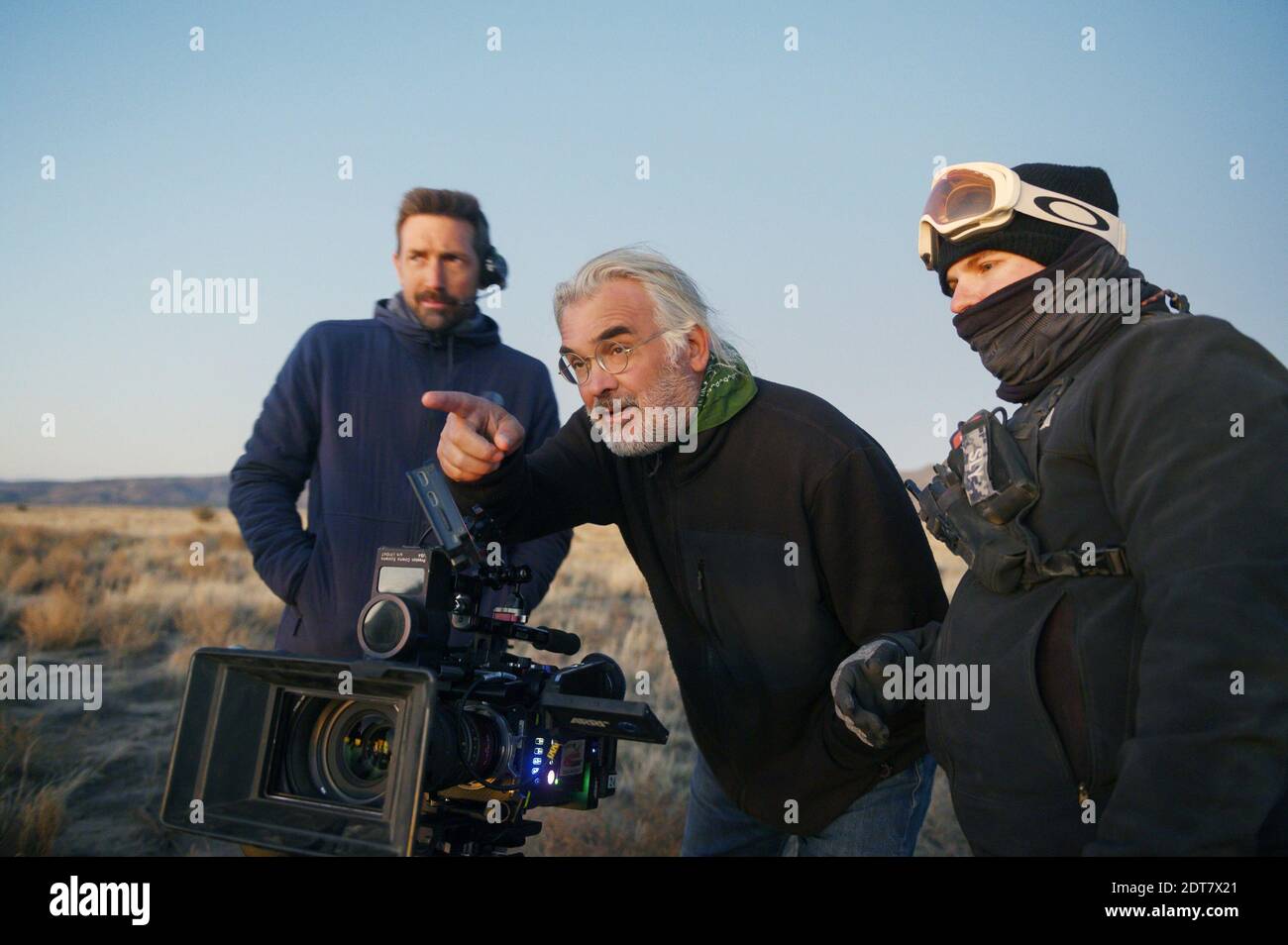 NEWS OF THE WORLD, director Paul Greengrass (center) with crew members ...