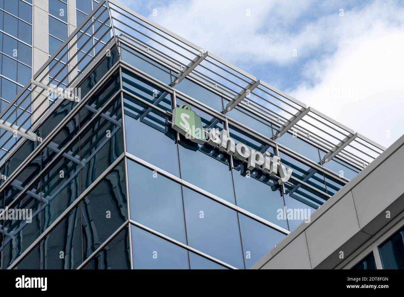 Shopify sign on their headquarters building in Ottawa, Ontario, Canada ...