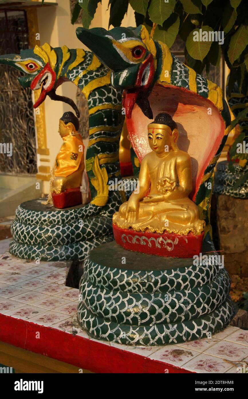 Buddha protected by the naga cobra serpent's hood, Botataung Pagoda ...