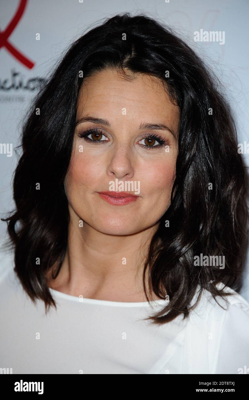 Faustine Bollaert posing at a photocall for the launching of the 2014 ...