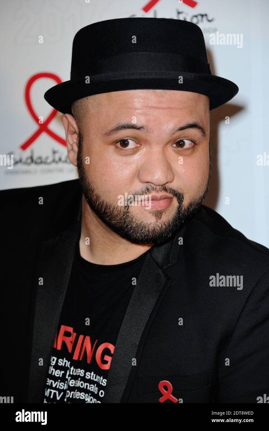 Raphael Yem posing at a photocall for the launching of the 2014 ...