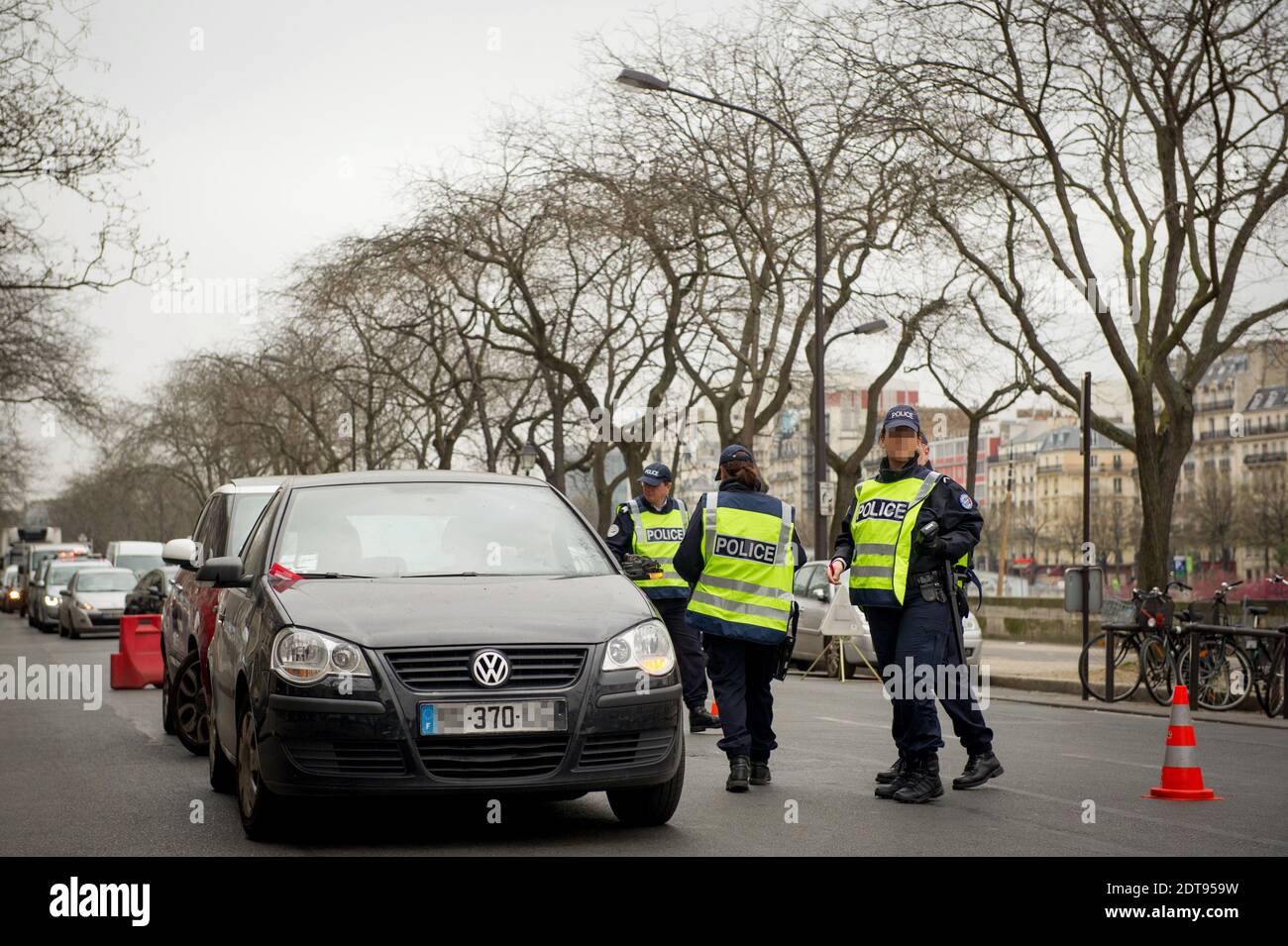 Police officers control cars with number plates ending in even numbers ...