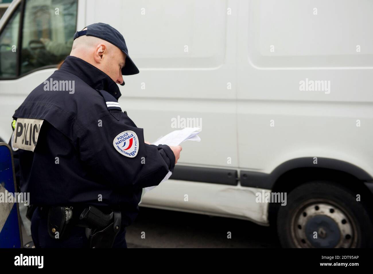 Police officers control cars with number plates ending in even numbers ...