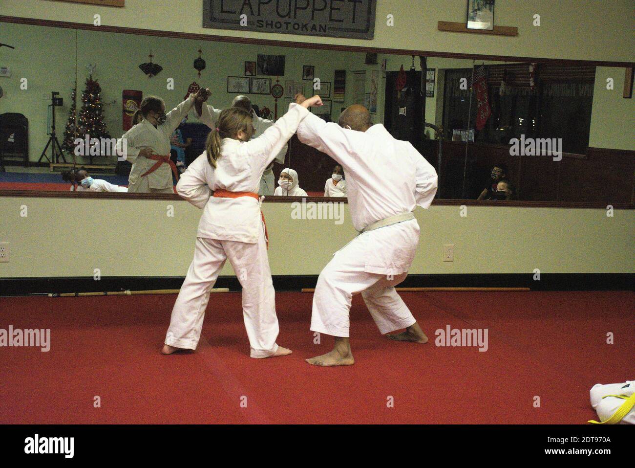 This action photo is of my daughter in her Karate class. Karate is a ...