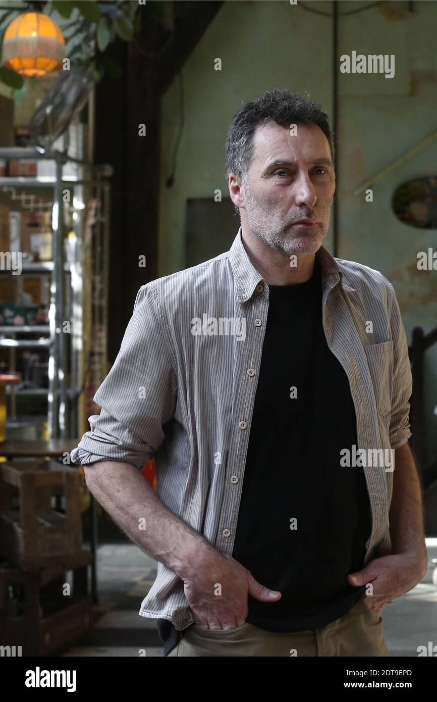 British artist Bruce Clarke poses before a press conference to present ...
