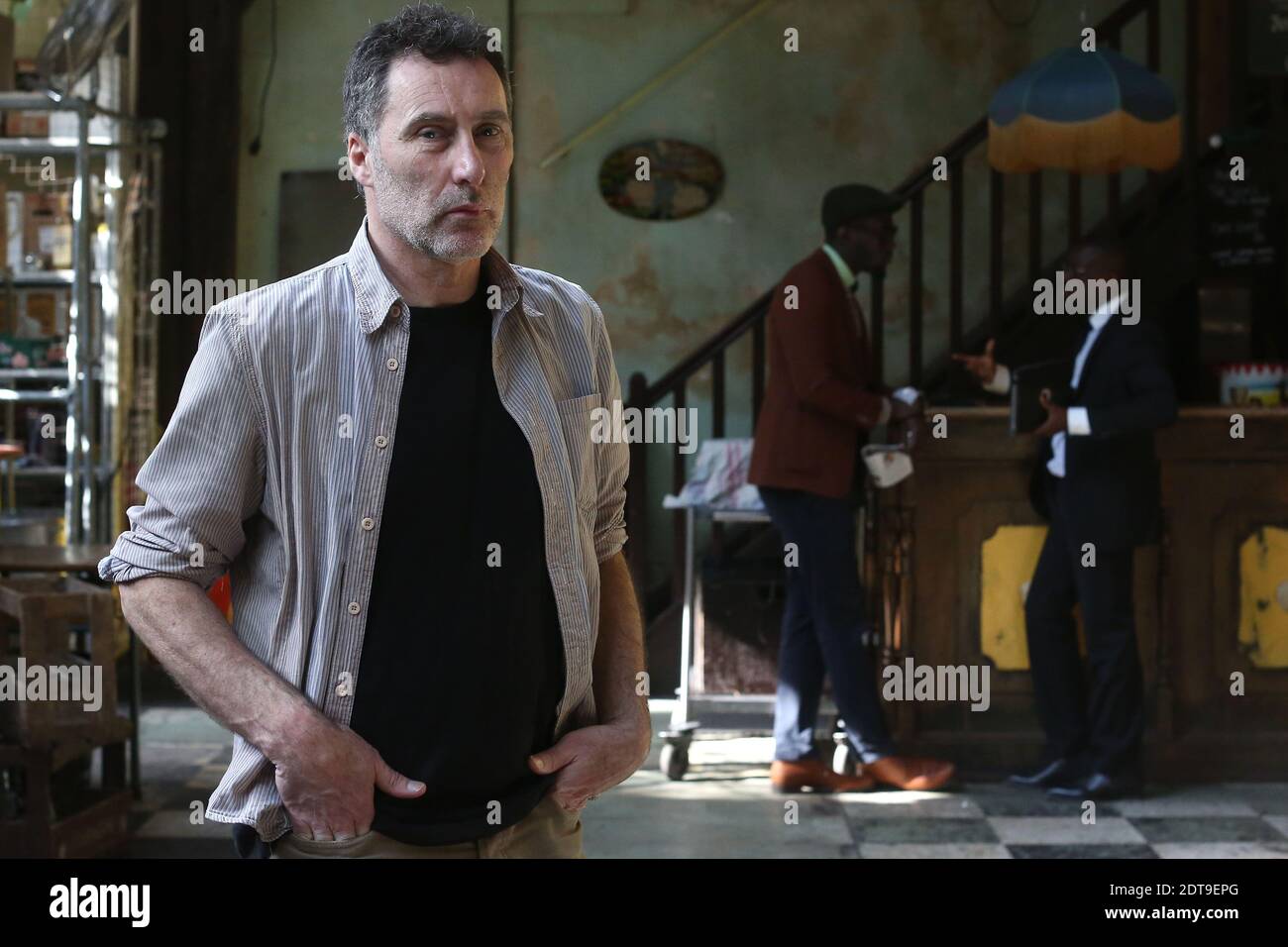 British artist Bruce Clarke poses before a press conference to present ...