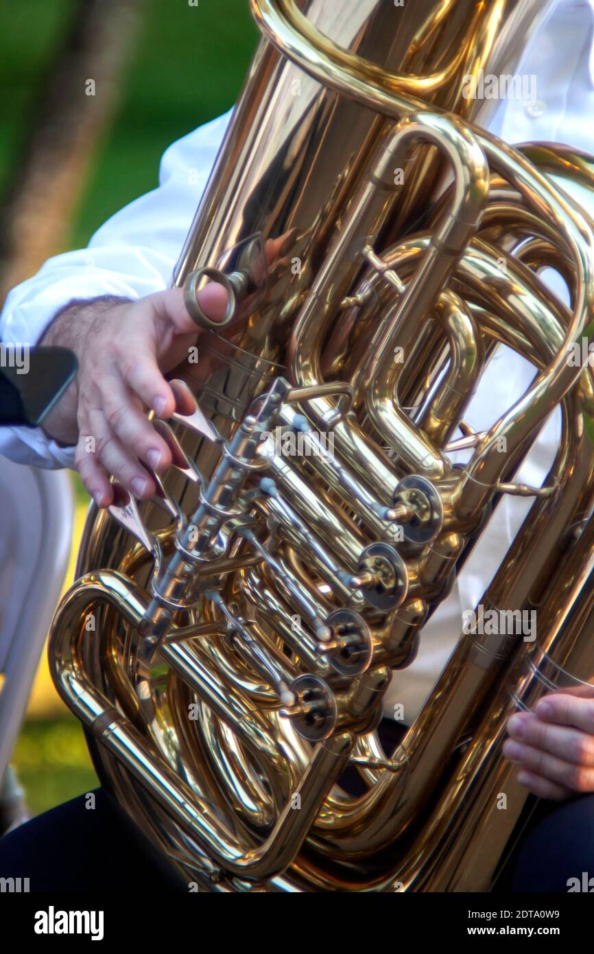 Man playing brass instrument hi-res stock photography and images - Alamy