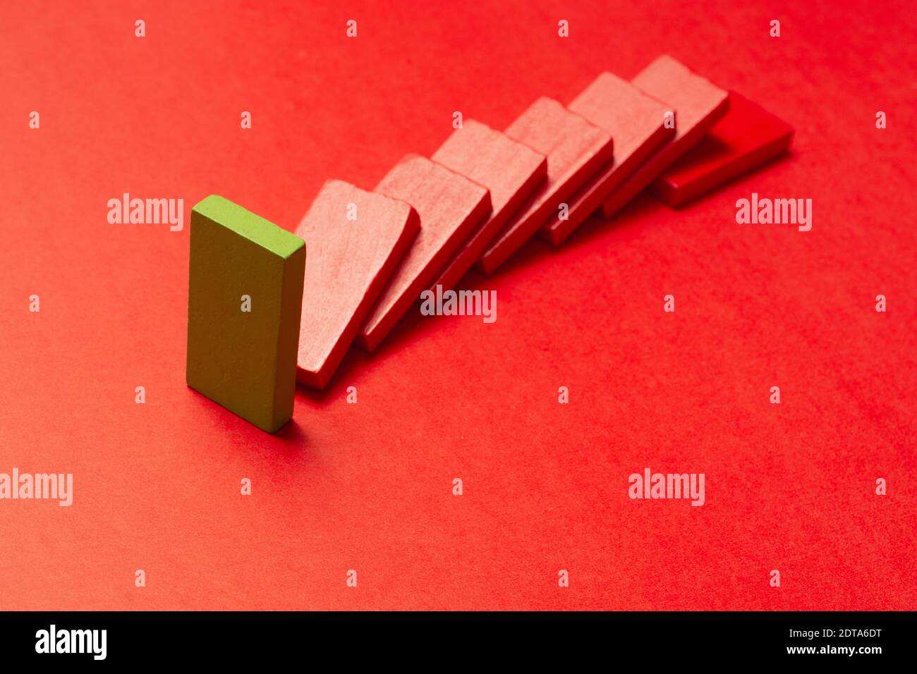 Colorful dominoes. Rainbow colored chain reaction Stock Photo - Alamy