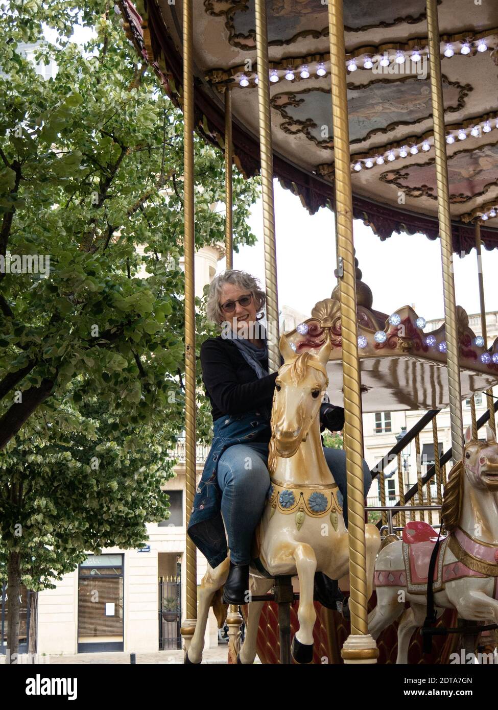 Woman carousel senior hi-res stock photography and images - Alamy