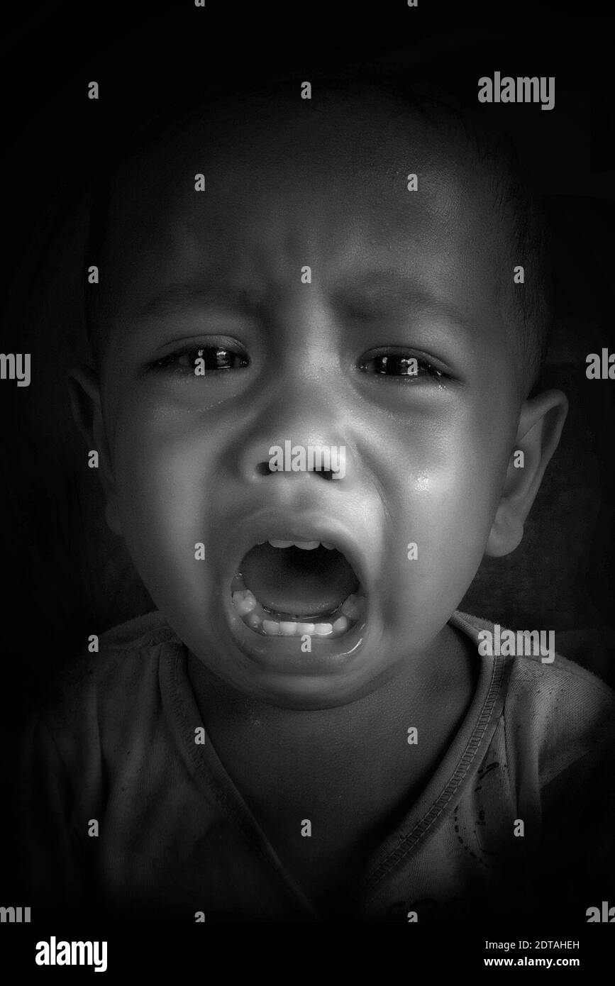 Indian boy crying hi-res stock photography and images - Alamy