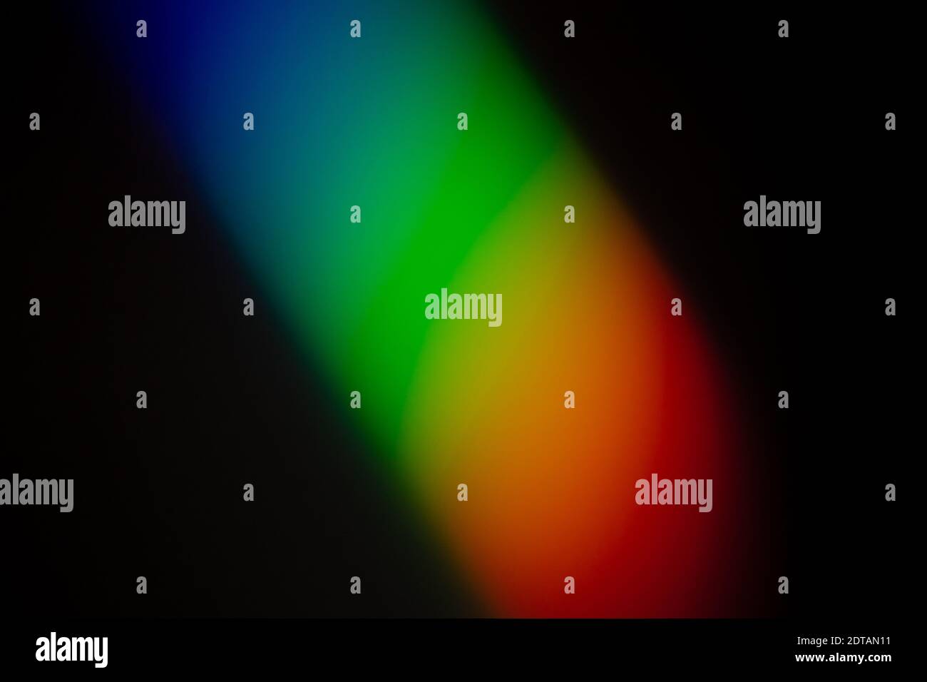 Clear and vibrant Rainbow color gradient reflect on a dark wall ...