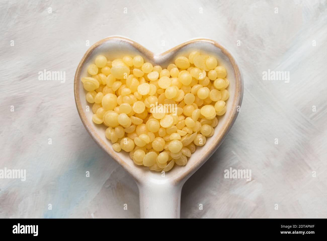 Beeswax pellets hi-res stock photography and images - Alamy