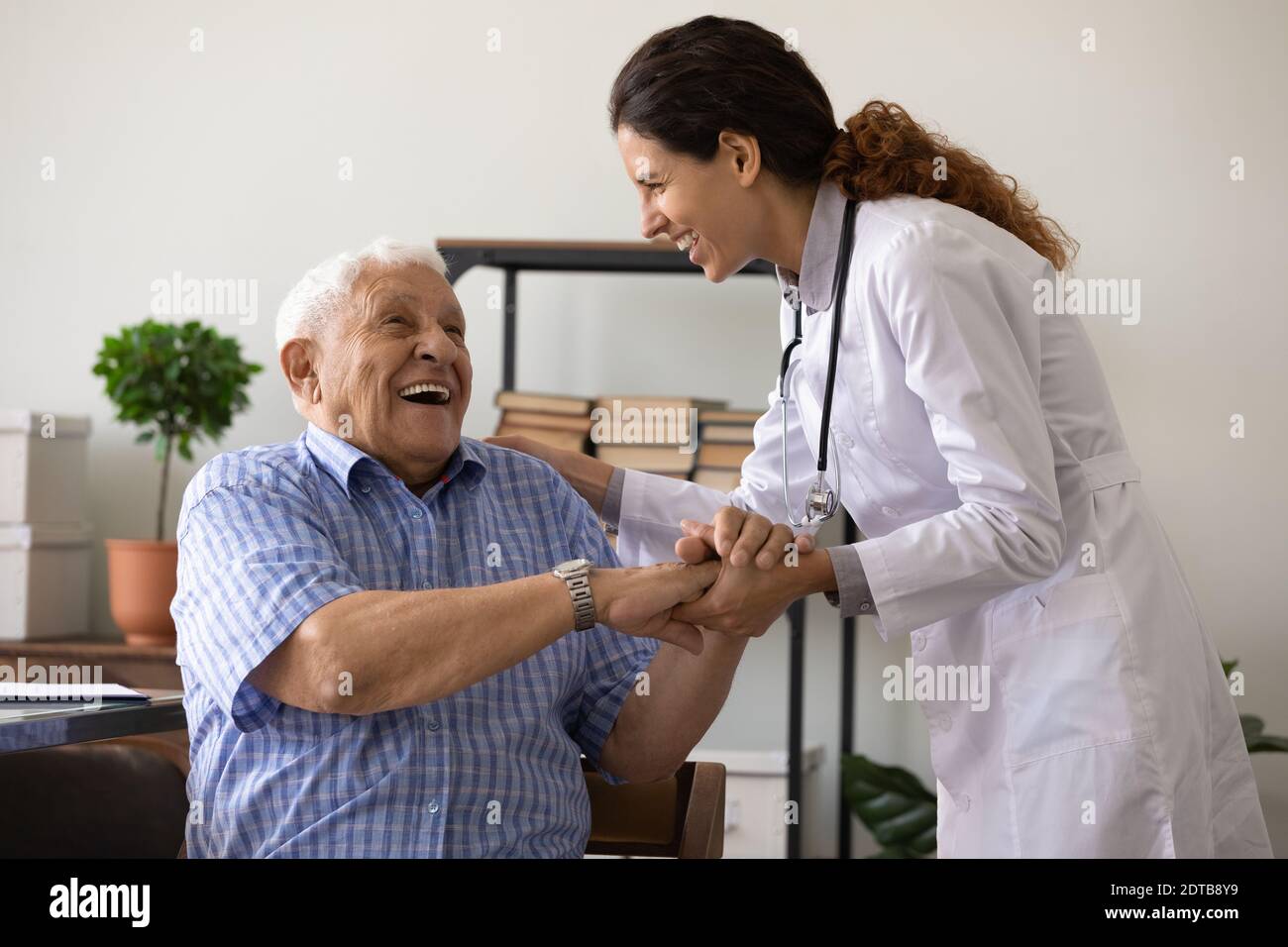Caring female doctor hi-res stock photography and images - Alamy