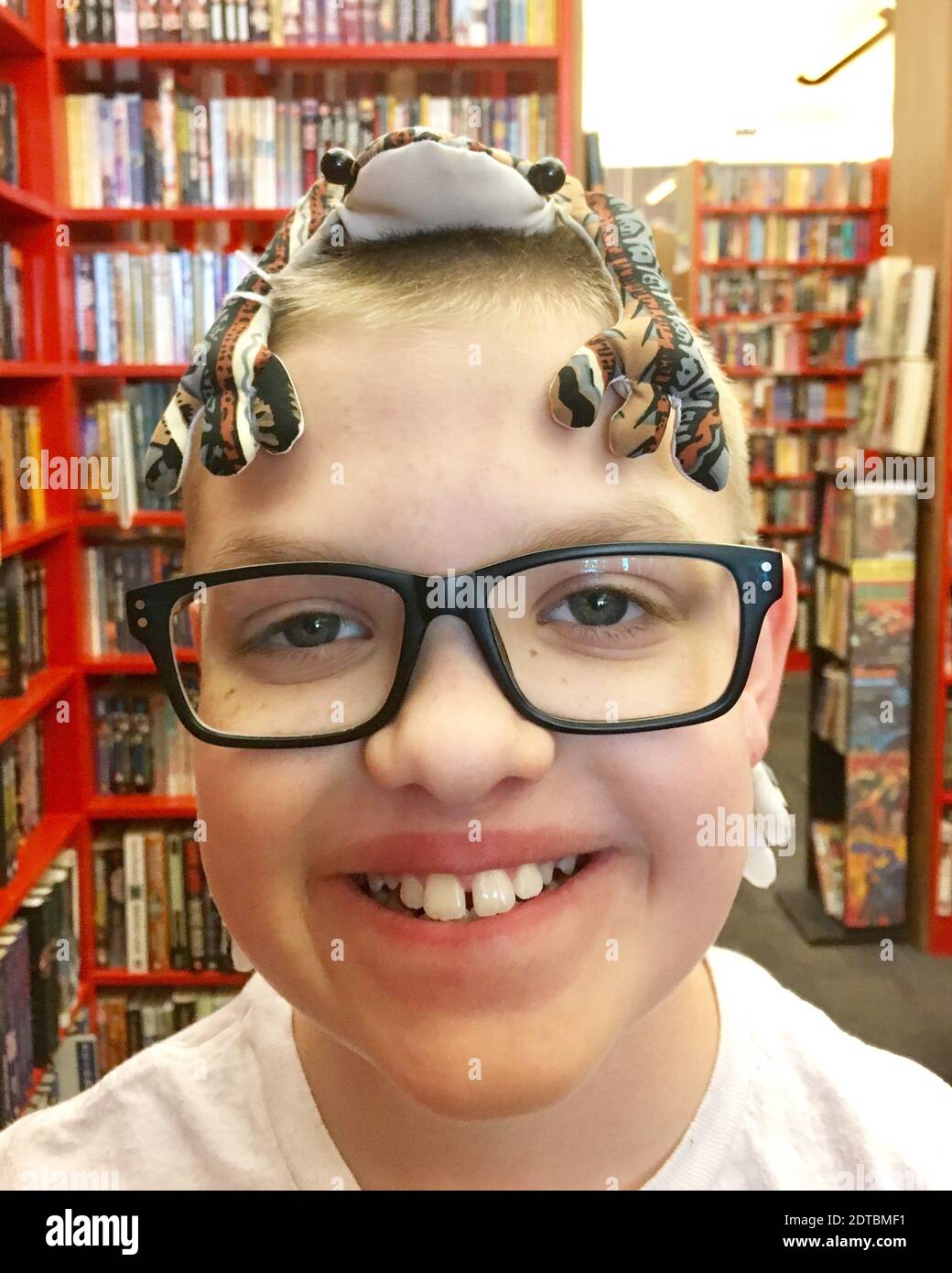Boy frog on head hi-res stock photography and images - Alamy