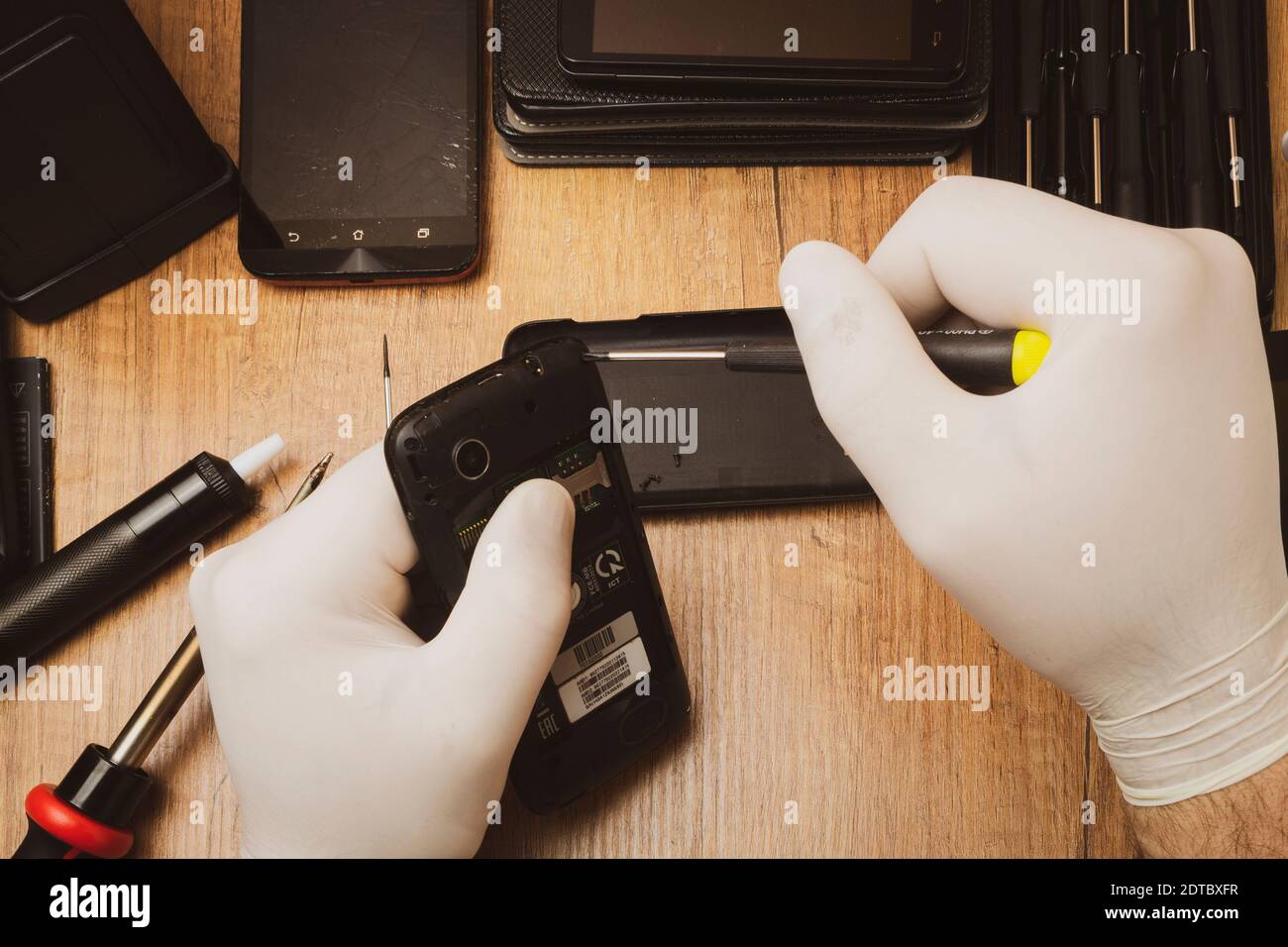 Mobile phone repair. Background and copy space Stock Photo - Alamy