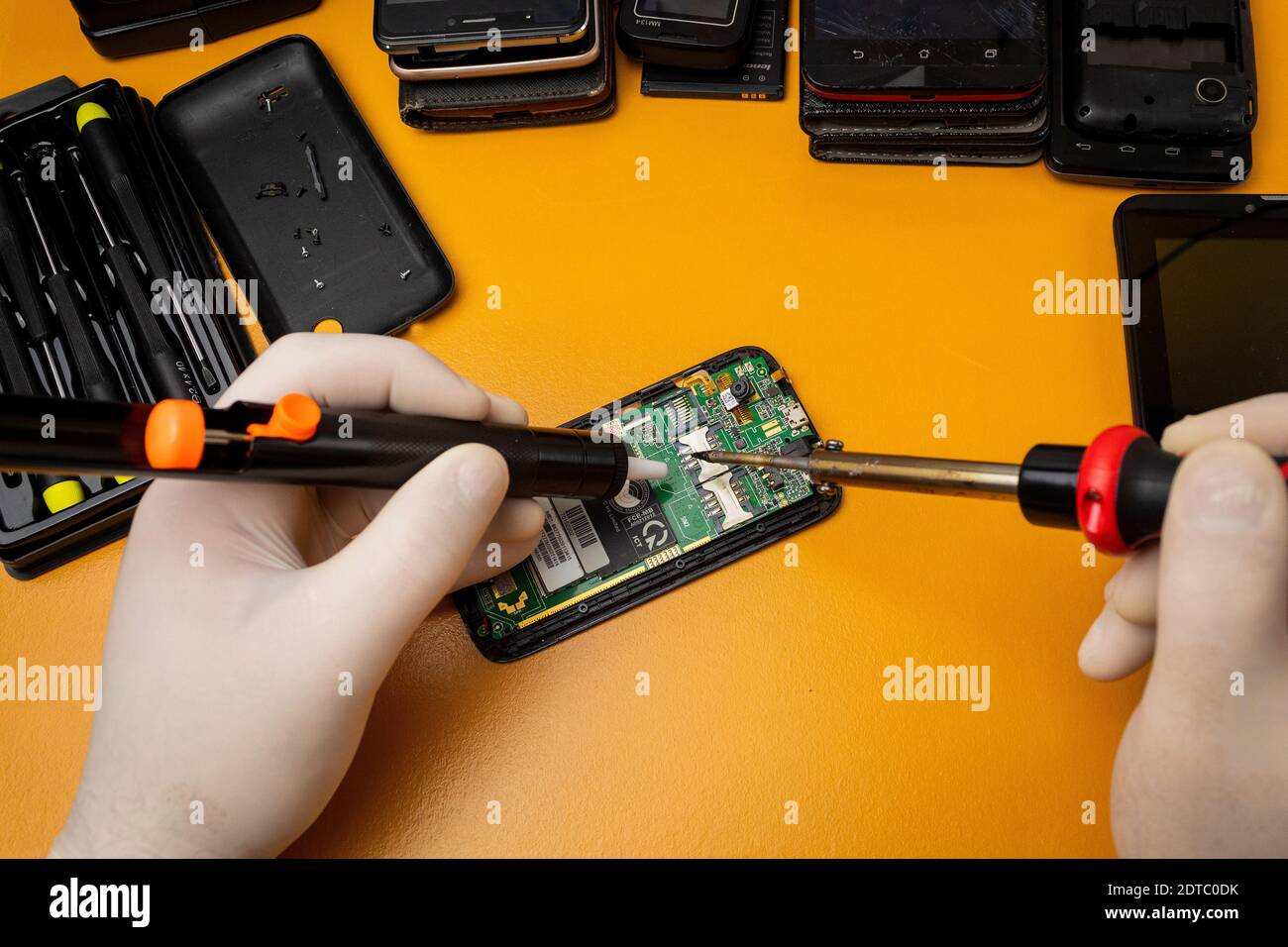 Mobile phone repair. Background and copy space Stock Photo - Alamy