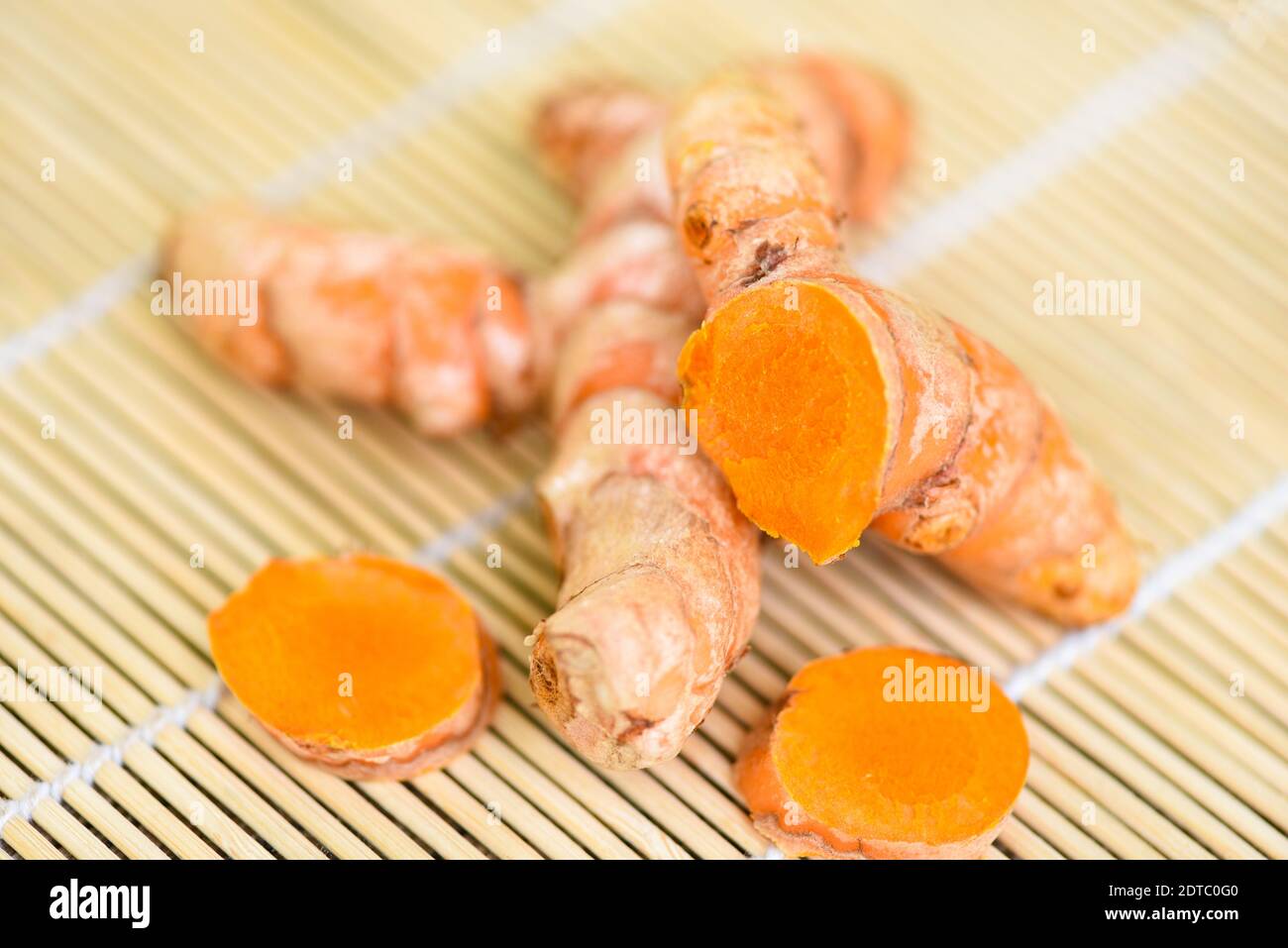 turmeric on wooden , fresh turmeric root for nature medicine herb and ...