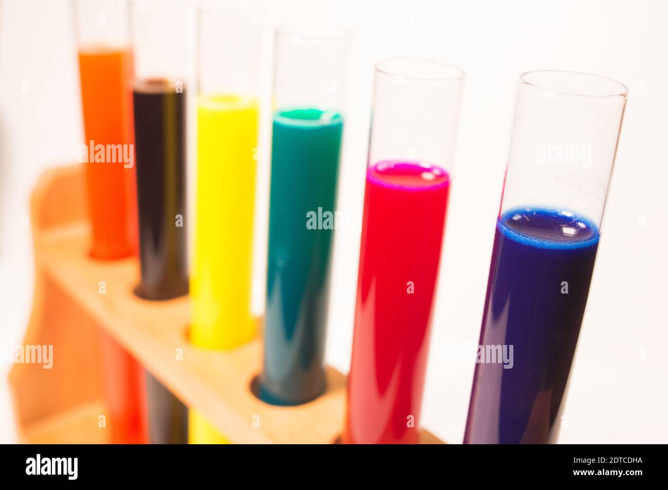 Multi Colored Liquid In Test Tubes On White Background Stock Photo - Alamy