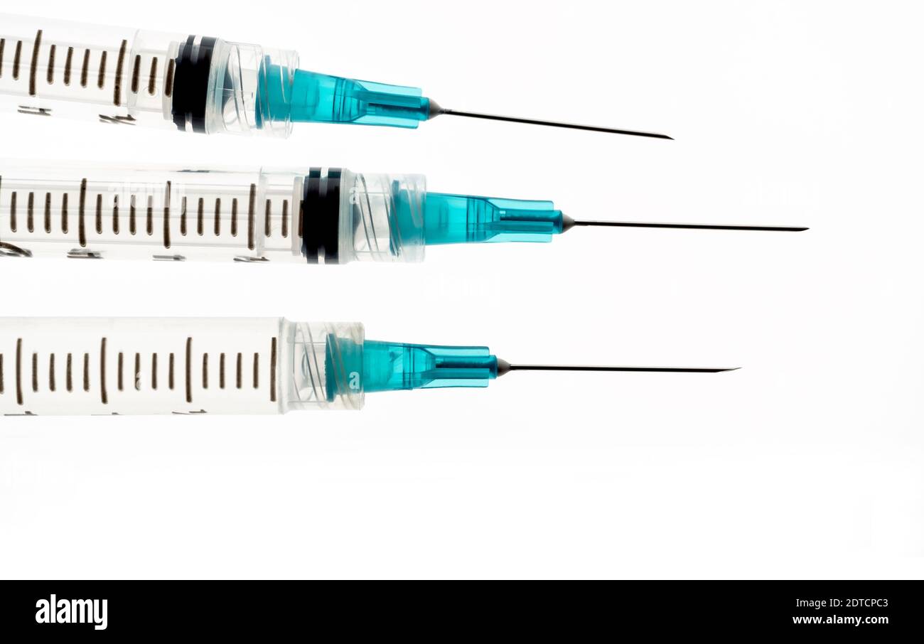 Studio shot of syringes with needles Stock Photo - Alamy