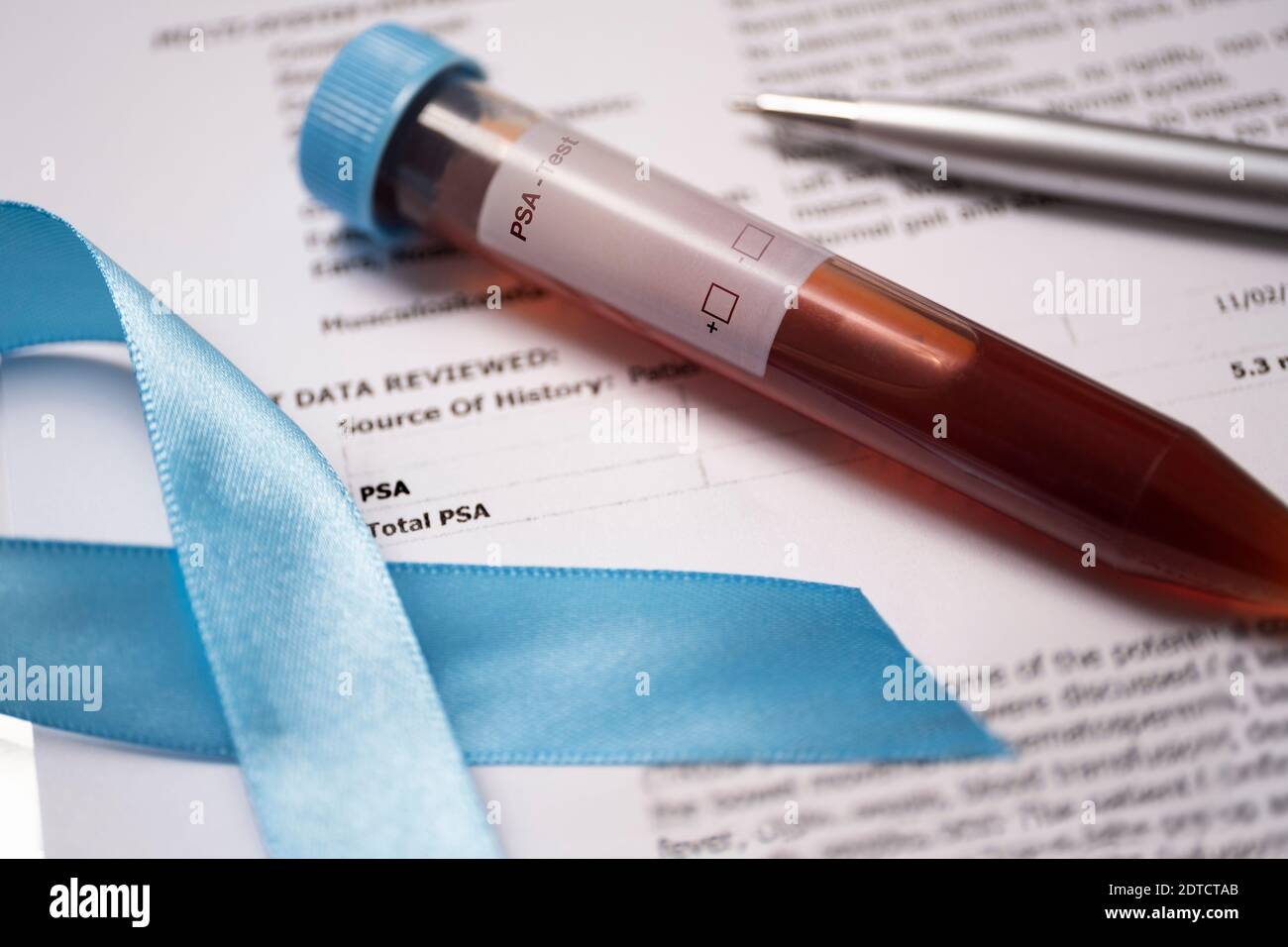 Close-up of prostate cancer blue ribbon and blood sample Stock Photo ...