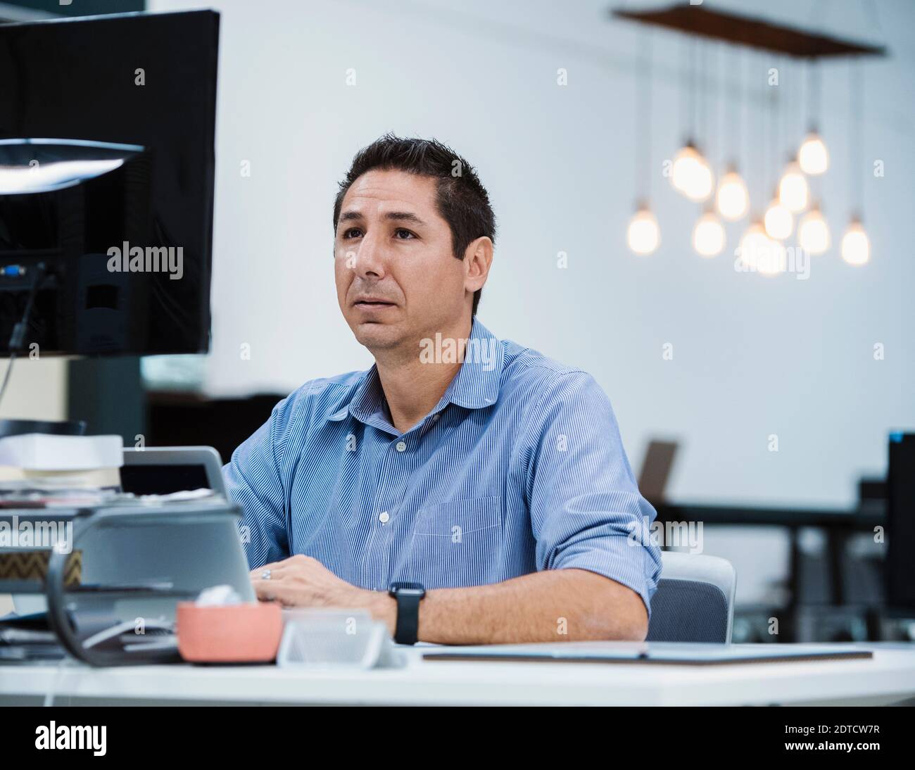 Man at office desk Stock Photo - Alamy