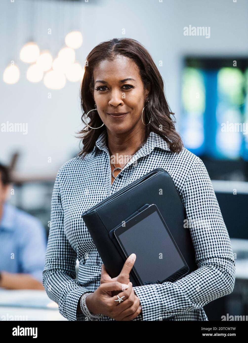 African businesswoman looking camera in hi-res stock photography and ...