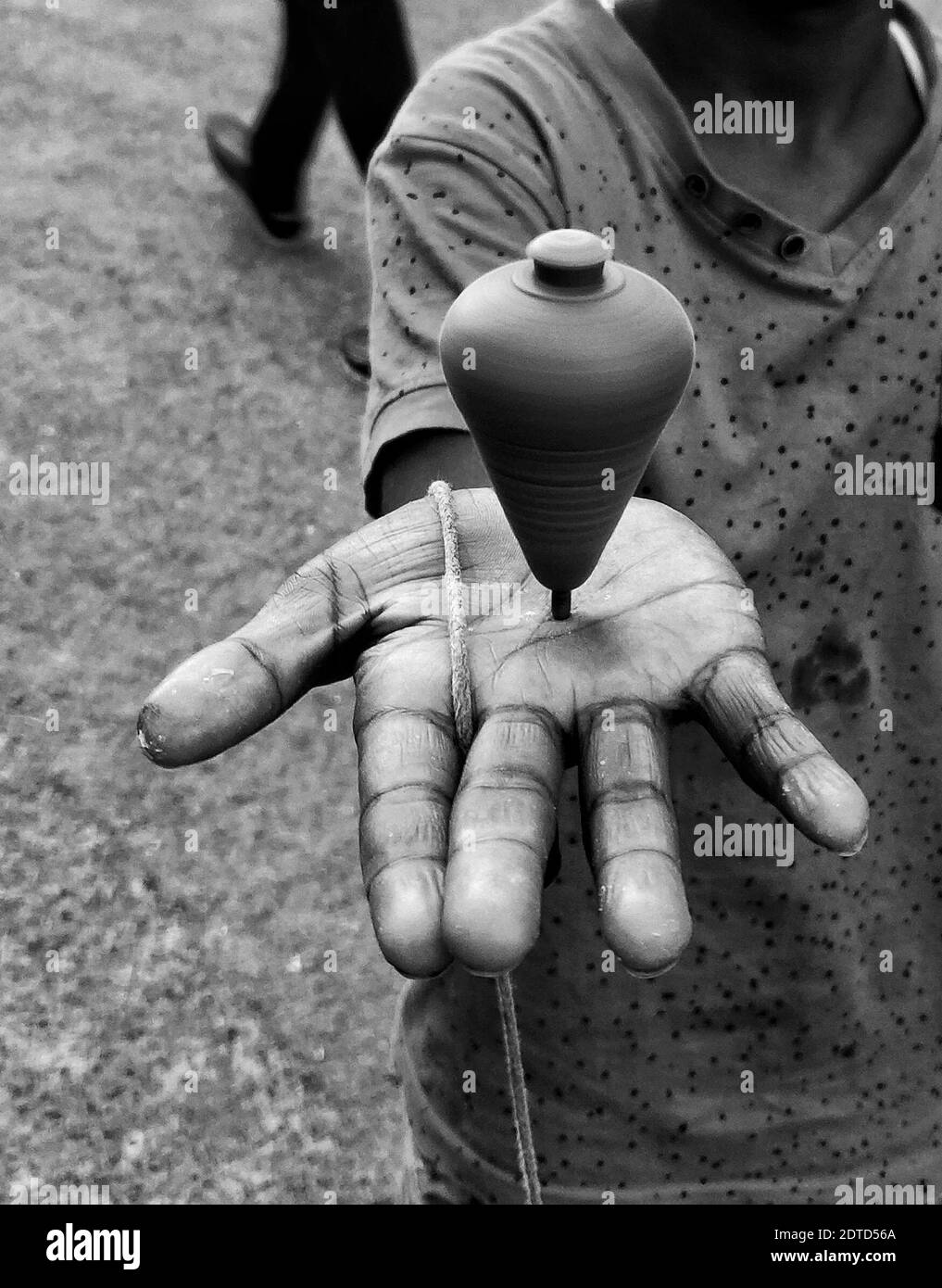 Hand spinning top Black and White Stock Photos & Images - Alamy