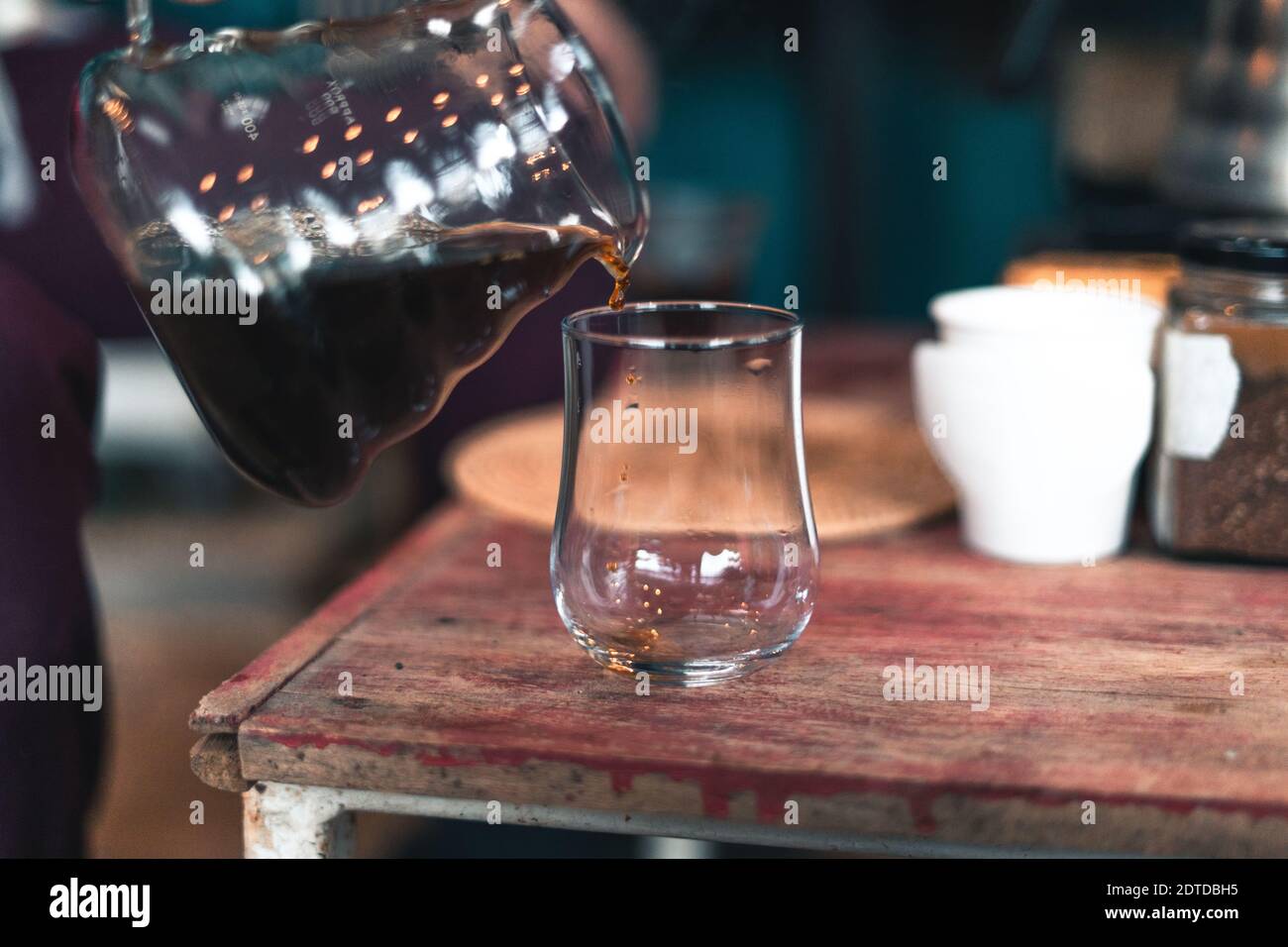 Drip coffee, barista pouring water on coffee ground with filter,brewing ...