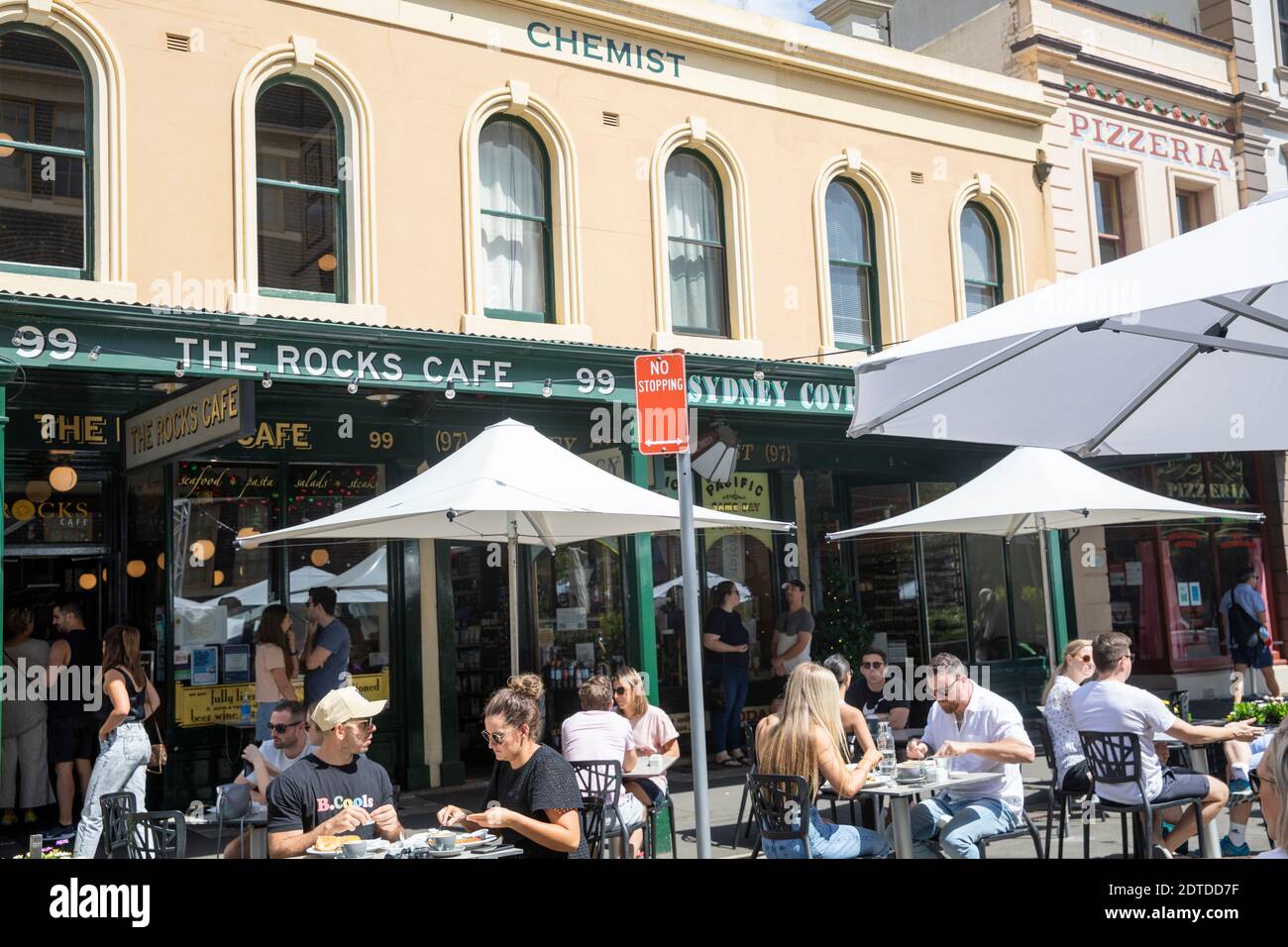 Sydney the Rocks area and people relaxing at a cafe restaurant on a ...