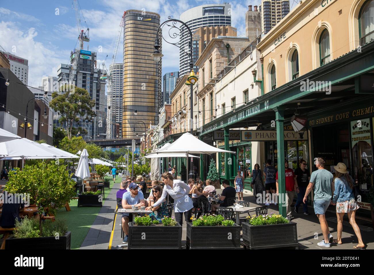 The Rocks Sydney local cafe and view of the skyscrapers and office ...