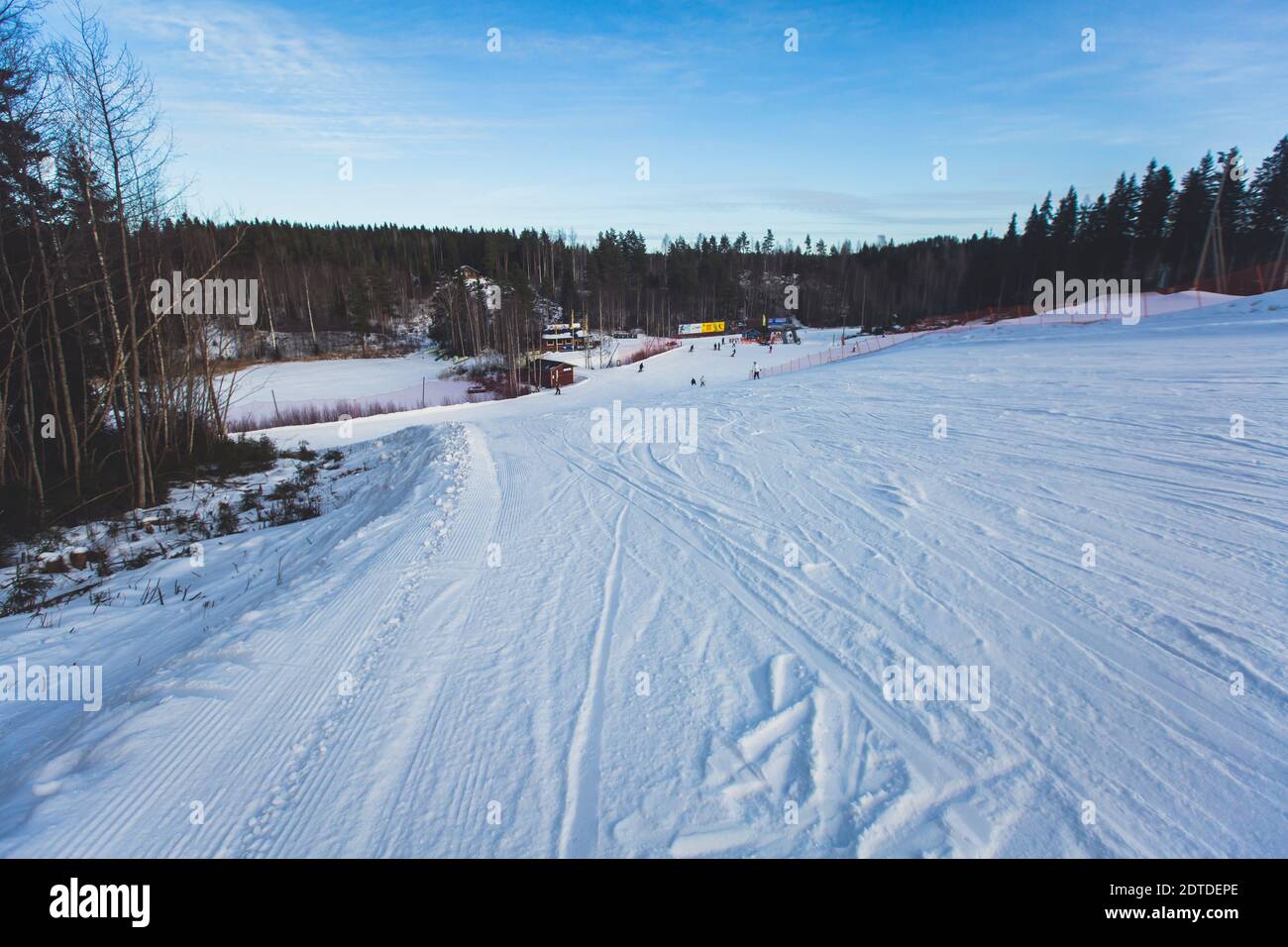 Beautiful cold mountain view of ski resort, sunny winter day with slope ...
