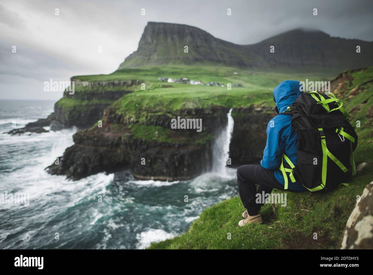 Denmark, Faroe Islands, Gasadalur Village, MÂ·Lafossur Waterfall, Man ...