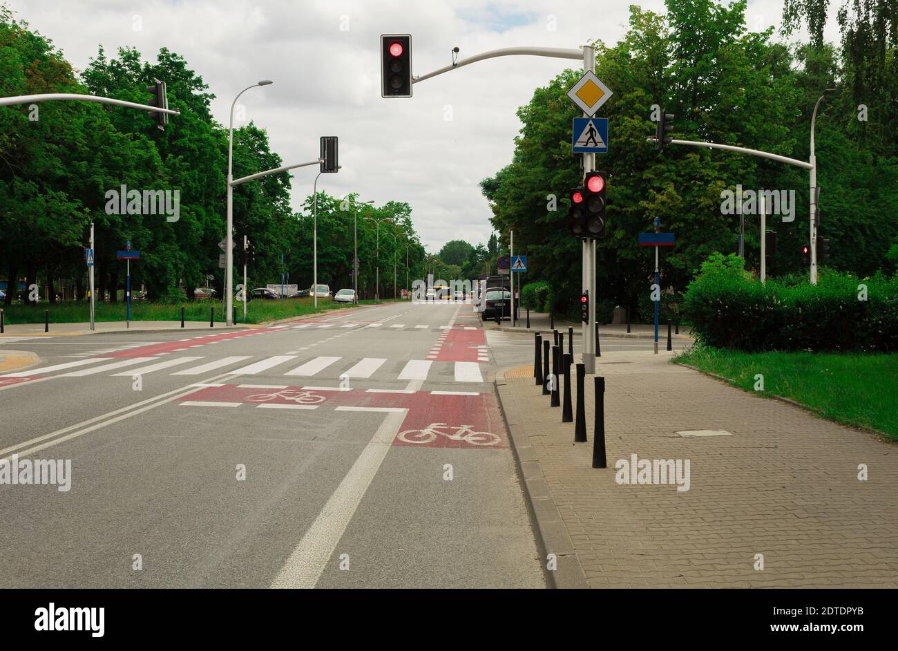 Bicycle lane on the side of the highway. Road sign and bike path on a ...
